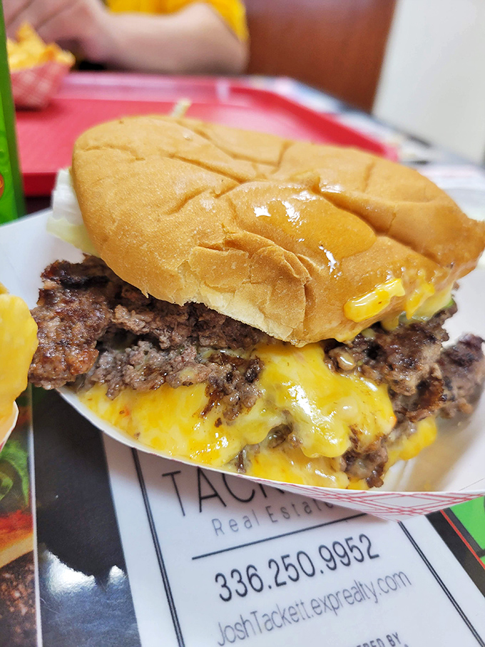 Cheese cascading down the sides of a hand-formed patty like a delicious yellow waterfall. This cheeseburger doesn't need a fancy introduction&mdash;it speaks for itself.