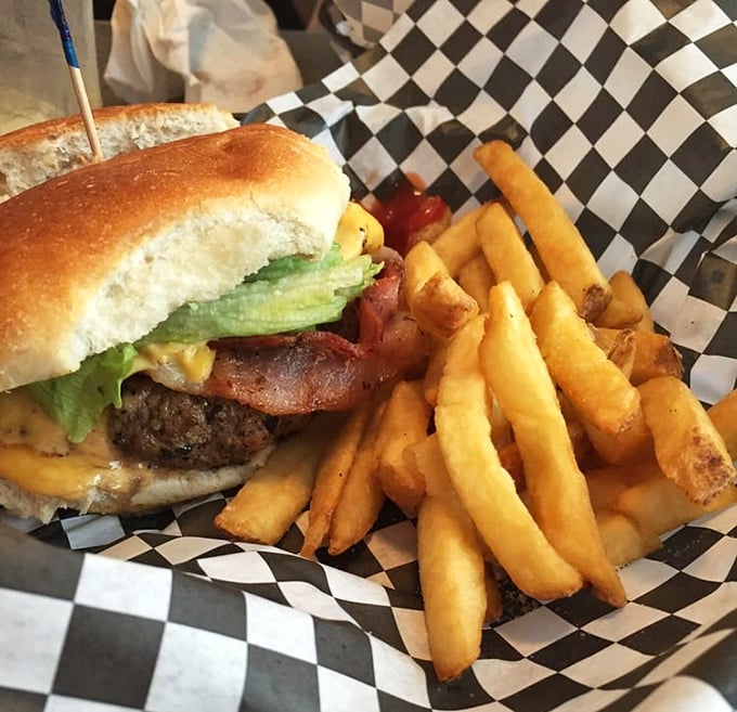 The cheeseburger and fries combo&mdash;America's most perfect food pairing since peanut butter met jelly, served on classic checkered paper.