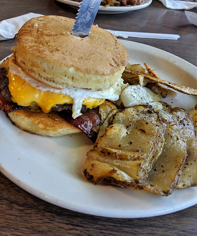 That burger-and-egg situation looks like breakfast and lunch had a delicious collision on your plate.
