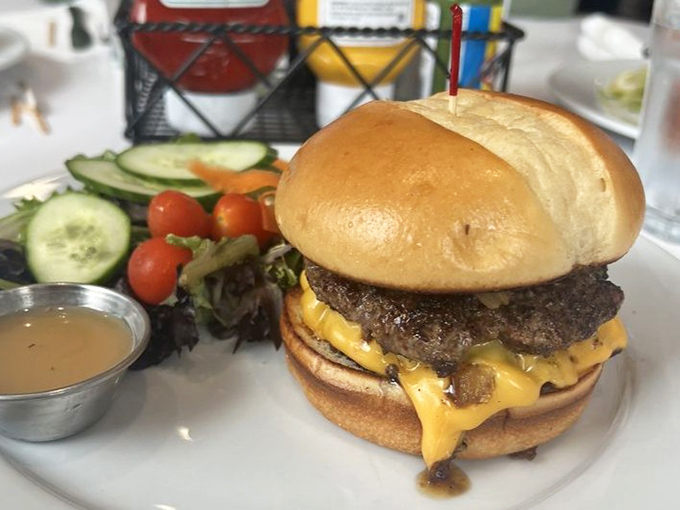 This isn't just a burger&mdash;it's a masterpiece of melted cheese cascading down a juicy patty like Niagara Falls, if Niagara Falls made your mouth water this much.