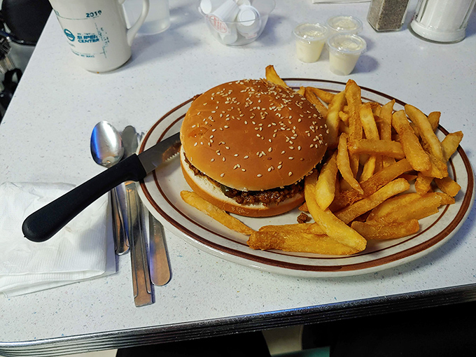 The classic cheeseburger and fries combo—where the sesame-topped bun meets juicy beef in a romance that's outlasted most Hollywood marriages.