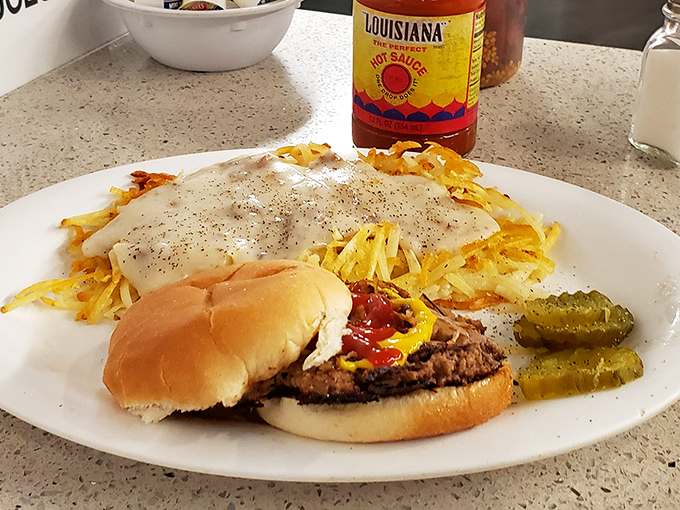 The perfect Kansas City plate&mdash;a burger with all the fixings alongside hash browns that somehow manage to be both crispy and tender in perfect harmony.