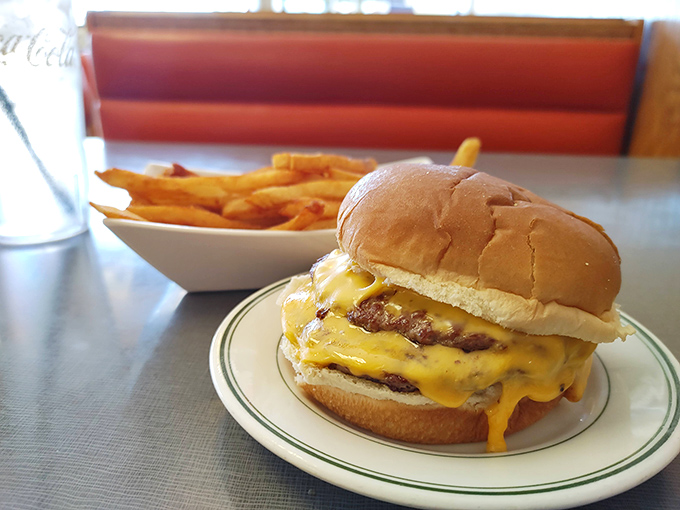 A proper diner cheeseburger doesn't need truffle aioli or artisanal buns &ndash; just melty American cheese cascading down a juicy patty like a yellow waterfall.