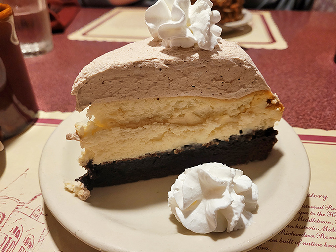 This towering slice of cheesecake could make even the most disciplined dieter throw caution completely to the wind.