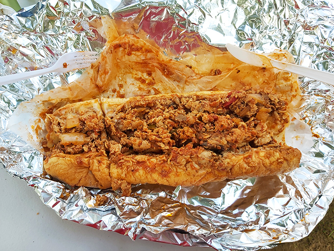 A proper cheesesteak isn't just a sandwich; it's an architectural achievement of meat, cheese, and bread that demands to be eaten immediately.