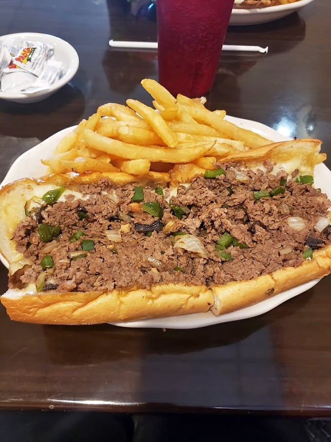 This cheesesteak isn't just a sandwich, it's an engineering marvel. Seasoned beef, peppers, and onions nestled in a roll that's up to the challenge.