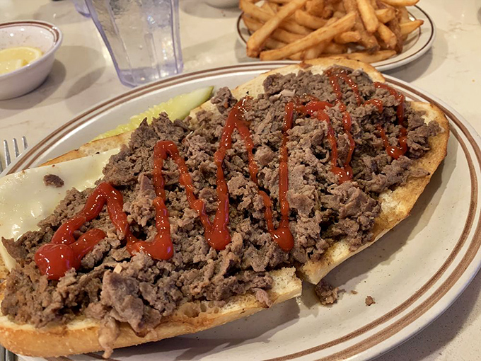 This cheesesteak isn't just a sandwich; it's a Pennsylvania philosophy expressed in beef, bread, and ketchup zigzags.