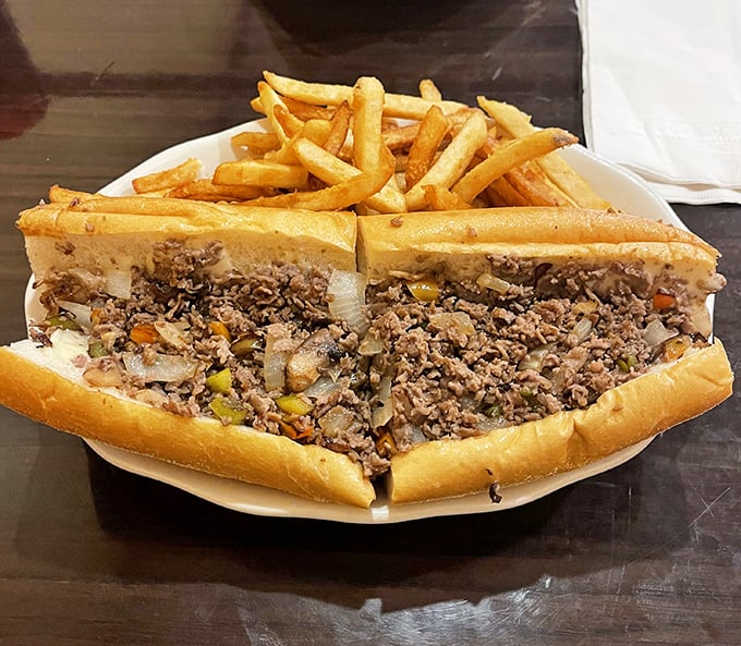 This cheesesteak isn't messing around&mdash;packed with savory filling and paired with golden fries, it's Philadelphia's famous sandwich with a Delaware accent.