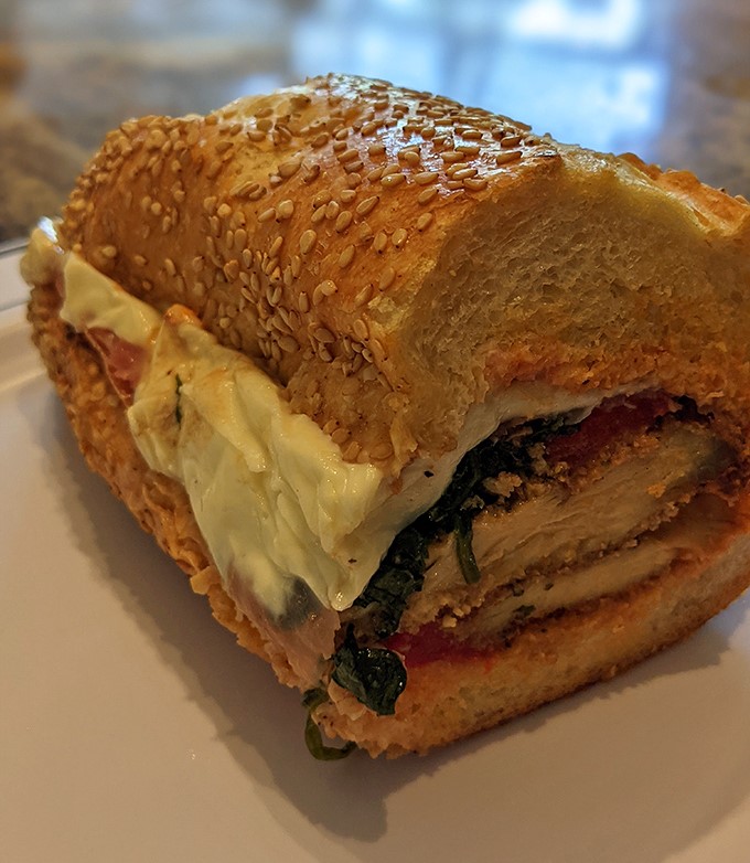 This chicken sandwich on sesame-studded bread isn't just lunch&mdash;it's edible architecture with layers of flavor that would make Frank Lloyd Wright jealous.