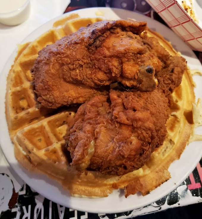 Southern meets Irish in this unexpected twist&mdash;crispy fried chicken atop golden waffles, proving cultural fusion can be deliciously rebellious.