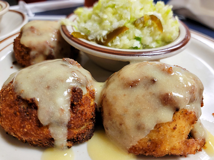 Chicken croquettes under a waterfall of gravy &ndash; crispy on the outside, creamy within, and enough to make you consider moving to Quarryville permanently.