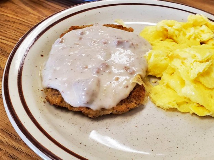 Country-fried steak smothered in gravy that could make a vegetarian weep with temptation. The scrambled eggs are just along for the glorious ride.
