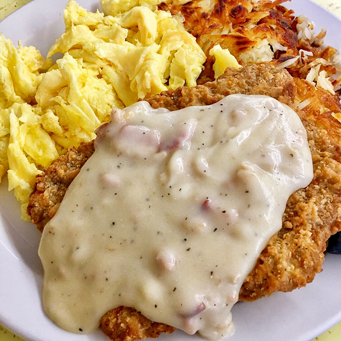 Chicken fried steak smothered in gravy that your cardiologist warned you about but your soul desperately needs.