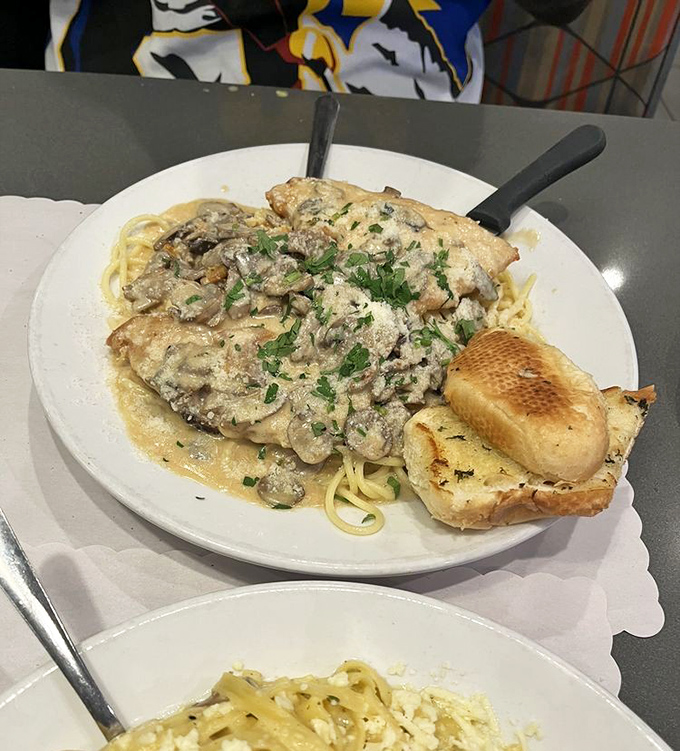 Chicken Marsala that would make an Italian grandmother nod in approval, served with enough pasta to feed the entire Soprano family.