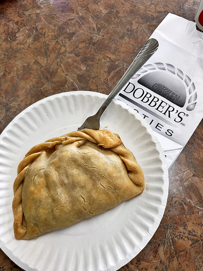 Perfection on a paper plate&mdash;the crimped edge of this pasty is the artisanal signature of a true Michigan classic.