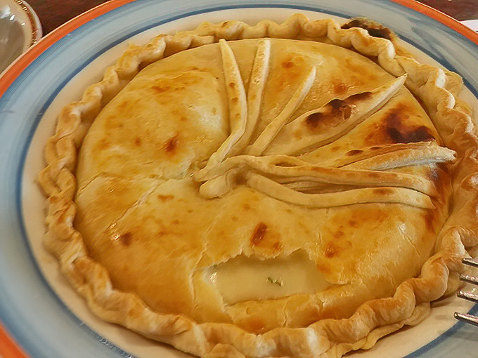 This chicken pot pie isn't just comfort food; it's edible architecture with a golden dome that promises savory treasures beneath.