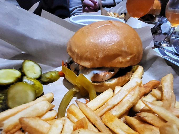 A burger that doesn't need fancy toppings to impress &ndash; just honest ingredients and proper execution. The pickles are the supporting actors who steal the scene.