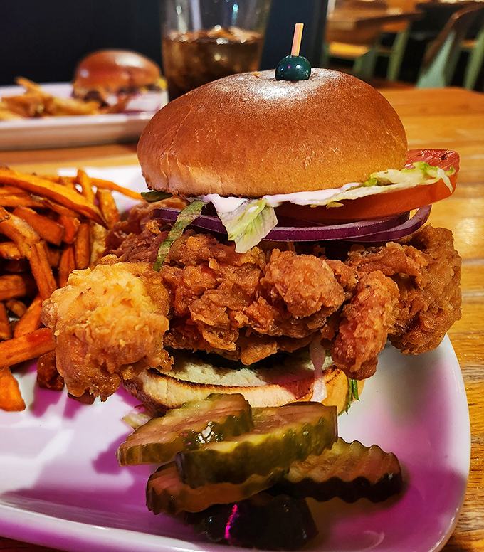 This Nashville Hot Chicken Sandwich isn't just food&mdash;it's an event. Towering, crispy, and demanding both hands and several napkins for proper enjoyment.