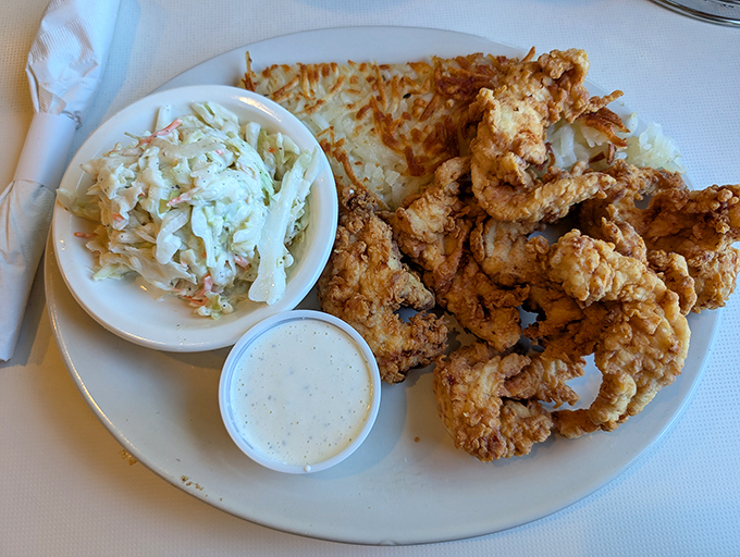 Golden-brown chicken tenders that actually taste like chicken! Paired with creamy coleslaw, they're proof that simple food done right is culinary poetry.