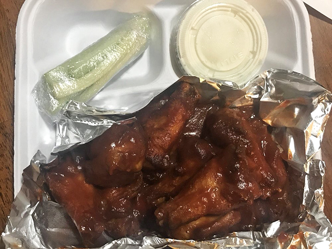 Wings so crispy they practically sing - each bite delivers that perfect balance of heat and flavor.