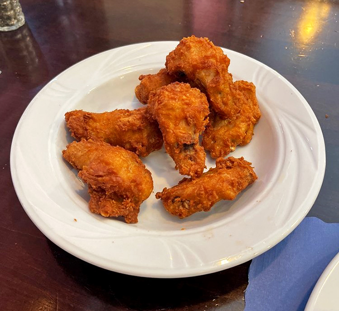 These golden-fried chicken wings aren't just appetizers&mdash;they're edible high-fives that crunch with each bite and make sharing optional.