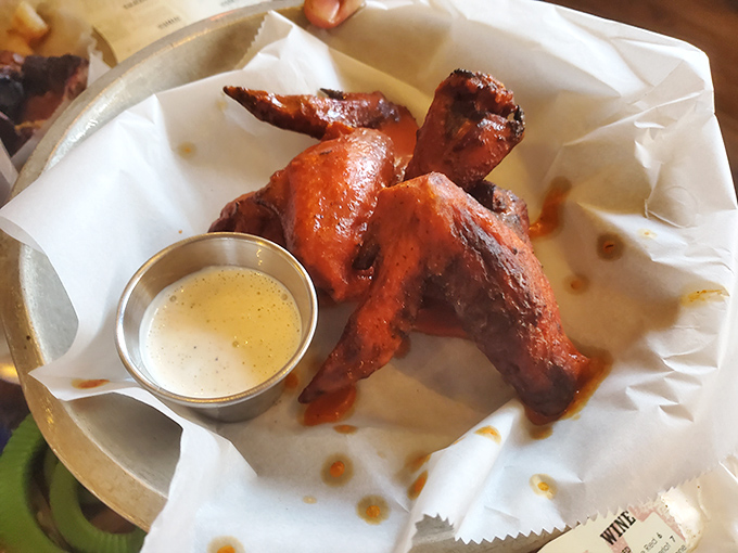 These wings aren't messing around &ndash; gloriously lacquered with sauce and accompanied by a dip that's asking you to make some important life decisions.