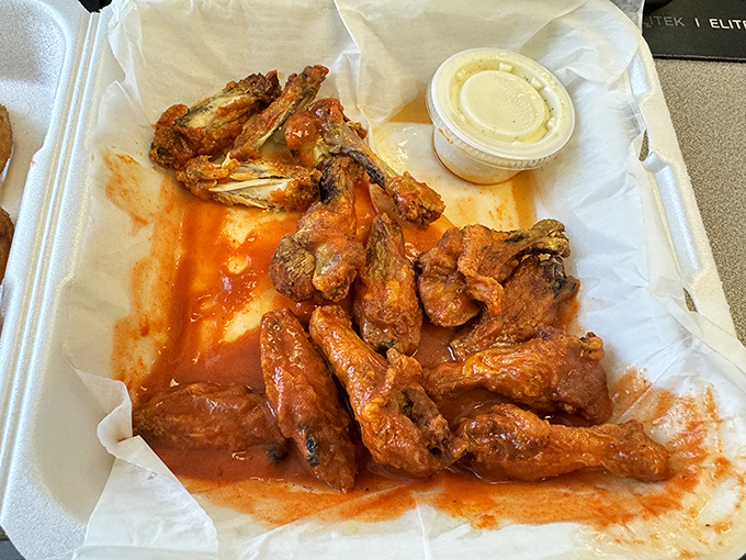 These wings aren't messing around. Saucy, substantial, and served with zero pretension&mdash;exactly how bar food should be in the Midwest.