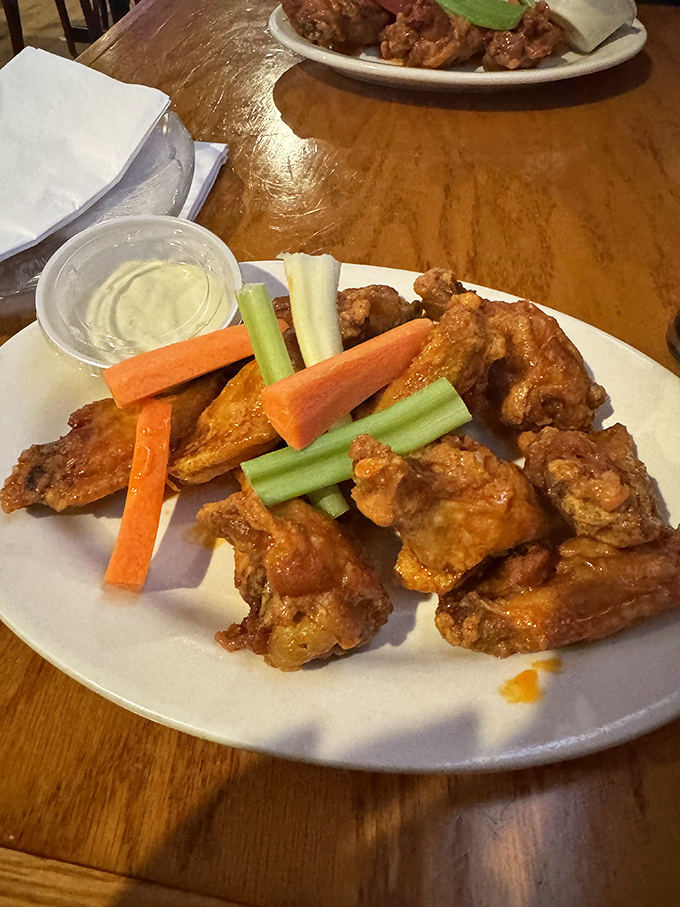 These wings aren't just good, they're tell-your-friends-about-them good, with crispy skin that snaps like the perfect vinyl record drop.