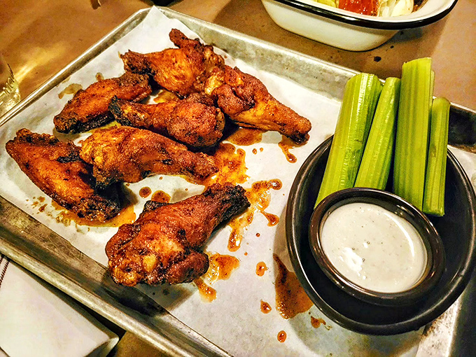 These aren't just wings; they're crispy, hickory-smoked flavor bombs that make you wonder why you ever bothered with those chain restaurant imposters.
