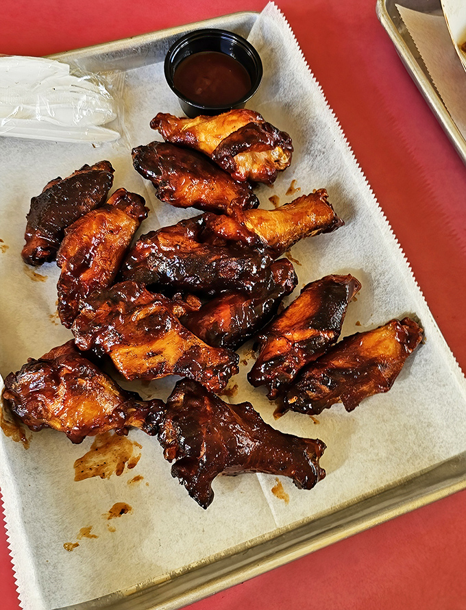 These wings aren't just smoked, they're transformed&mdash;each one a glistening testament to patience, fire, and the magic that happens when the two meet.