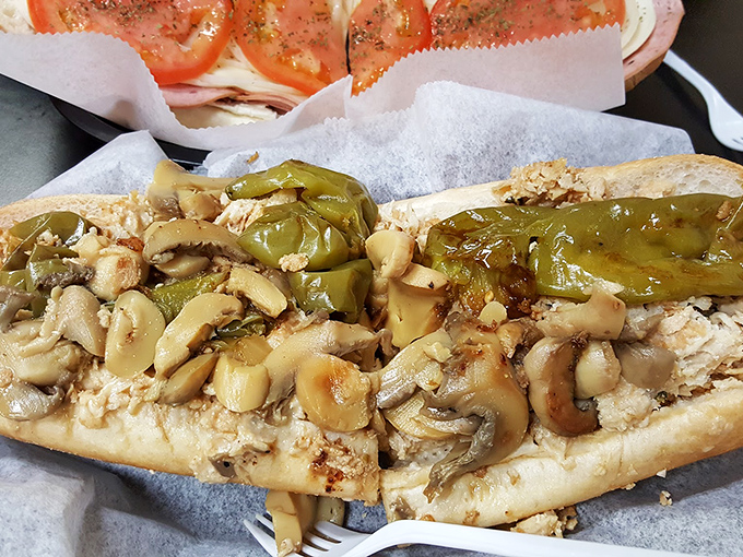 This chicken cheesesteak with mushrooms and peppers isn't just a sandwich—it's therapy between bread. The melty cheese hugs every morsel of chicken.