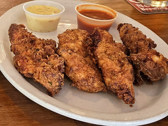 Golden chicken tenders that'll transport you back to simpler times, served with serious dipping options.