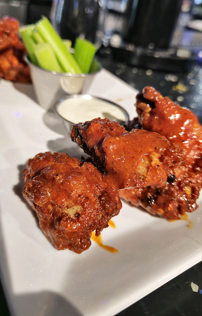 These wings aren't just crispy, they're the kind that make you involuntarily close your eyes on first bite &ndash; meditation through chicken.