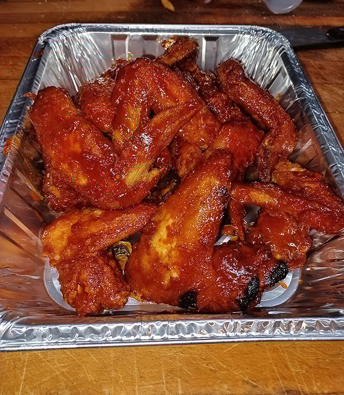 These wings aren't playing around. Glossy, saucy, and ready to kickstart your meal with a flavor punch.