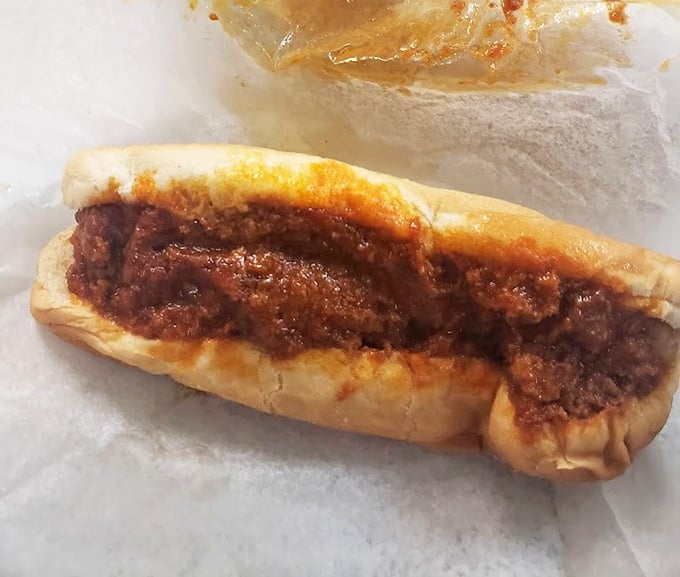 The chili bun &ndash; where simplicity meets satisfaction in a perfect marriage of soft bread and savory meat sauce. Napkins required, regrets impossible.