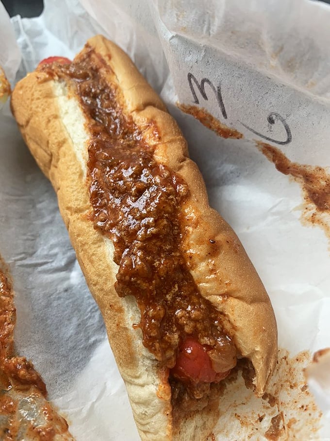 The chili dog that launched a thousand road trips. That homemade chili doesn't just sit on the hot dog&mdash;it transforms it.