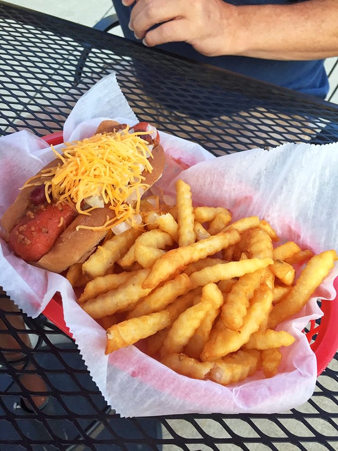 A proper chili dog with crinkle-cut fries&mdash;the kind of honest lunch that reminds you why simple food done right is unbeatable.