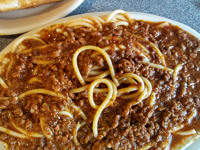 Cincinnati-style chili isn't just food; it's an edible art form. This silky, spice-infused masterpiece transforms ordinary spaghetti into something extraordinary.
