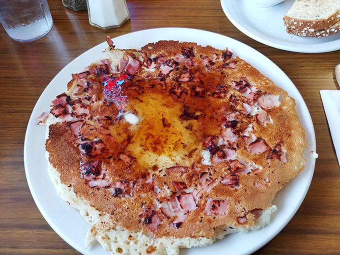 The Chinese Pancake isn't just breakfast&mdash;it's edible architecture. A crispy exterior houses savory ham and egg in perfect harmony.