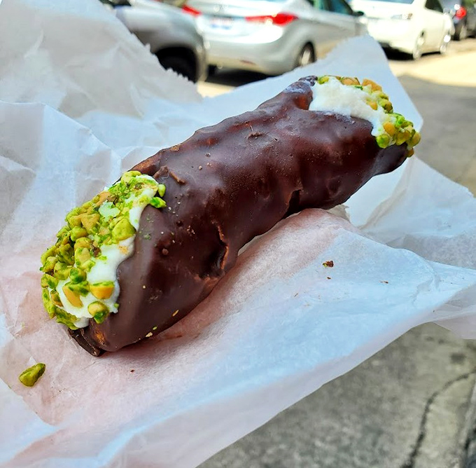 Chocolate meets pistachio in this cannoli showdown. The crisp shell shatters with each bite, revealing creamy filling that would make Sicily proud.