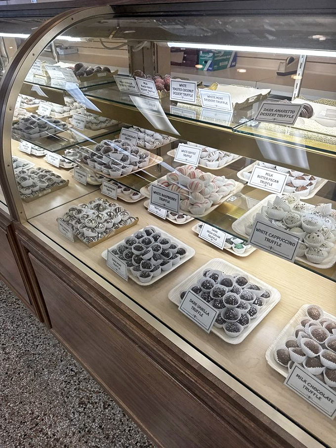 Truffles, meltaways, and chocolate-covered delights beckon from their display case like celebrities on a delicious red carpet.