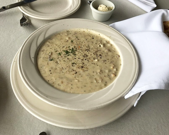 This isn't just clam chowder; it's a creamy bowl of maritime comfort that whispers tales of foggy mornings and salty sea air.