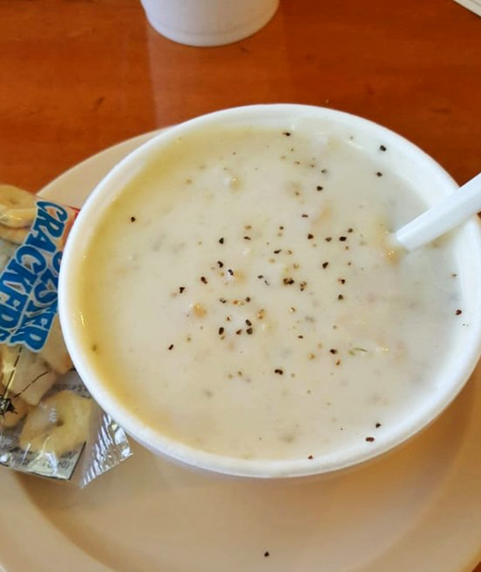 This clam chowder isn't just soup; it's a creamy, peppery hug in a bowl that would make a New Englander nod in reluctant approval.