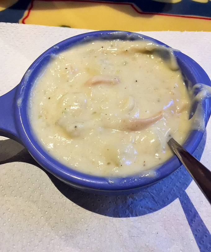 A blue bowl of liquid comfort. This clam chowder isn't just creamy&mdash;it's the kind that makes you scrape the bottom hoping for one more spoonful.