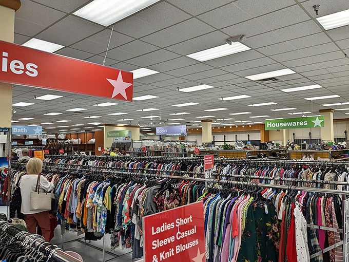 The clothing forest where fashion treasures hide. Color-coded racks make hunting for your next favorite outfit surprisingly manageable.