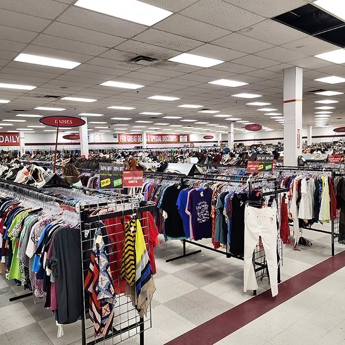 The clothing section stretches to the horizon like a textile ocean. Somewhere in this sea of fabric swims the perfect vintage band tee.