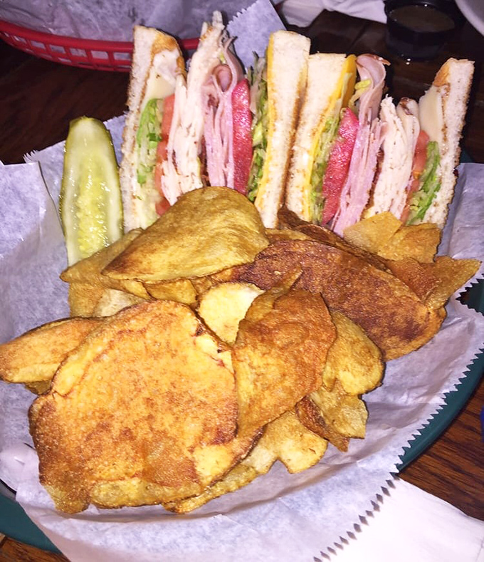 This club sandwich isn't playing around &ndash; stacked higher than my college debt and twice as satisfying. Those house-made chips deserve their own fan club.