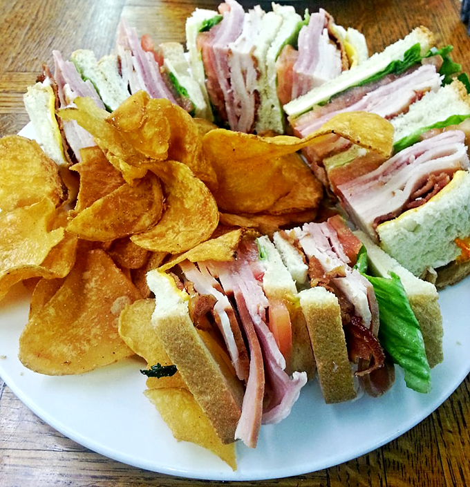 Layer upon glorious layer of deli meats and fresh veggies, this club sandwich doesn't just satisfy hunger&mdash;it obliterates it with delicious precision.