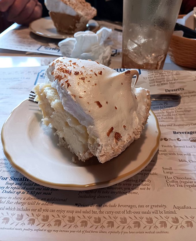 This coconut cream pie doesn't just have height&mdash;it has presence. The meringue stands taller than my retirement dreams.