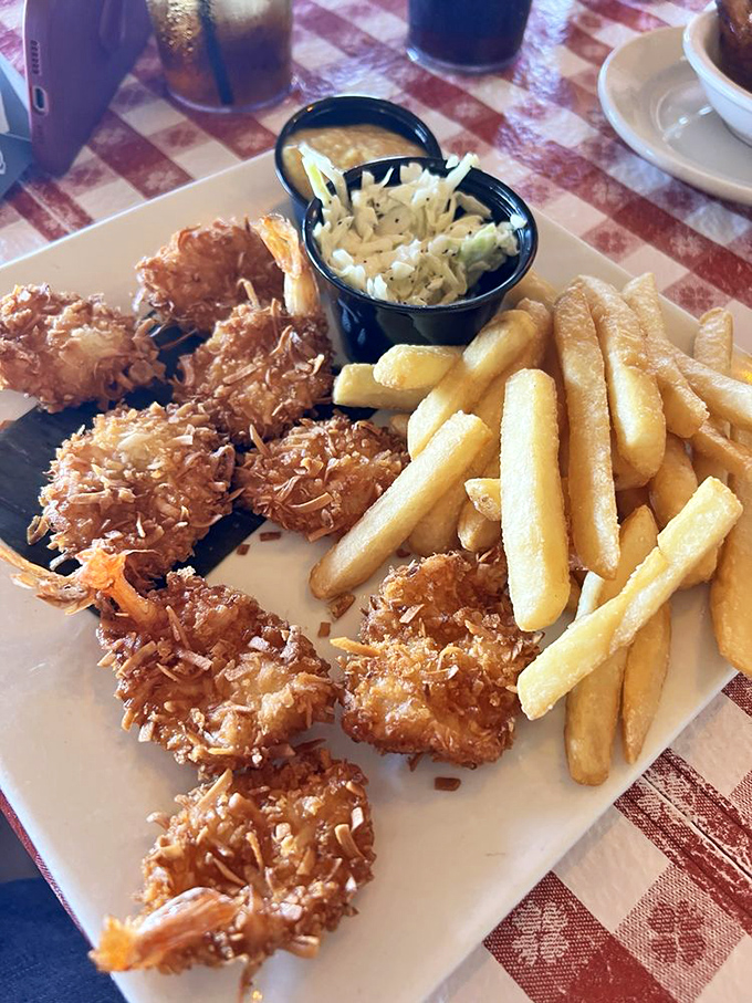 Coconut shrimp that crackle with tropical sweetness. The perfect marriage of crunchy exterior and tender seafood that transports you straight to island time.
